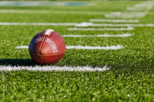 Football on Field Stock Photo | Adobe Stock
