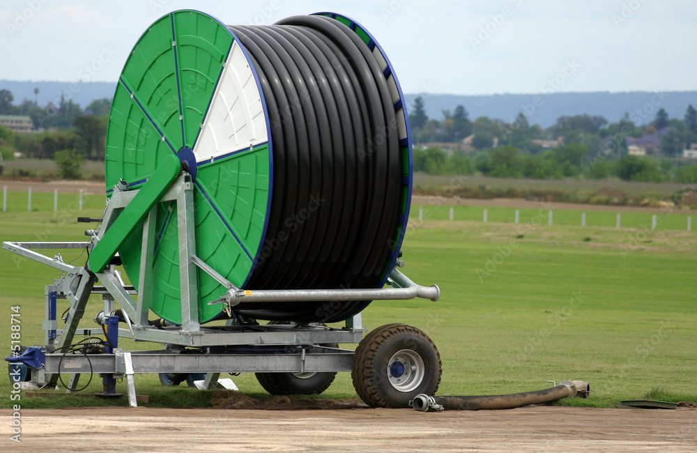 Spool of Irrigation Pipe Stock Photo | Adobe Stock