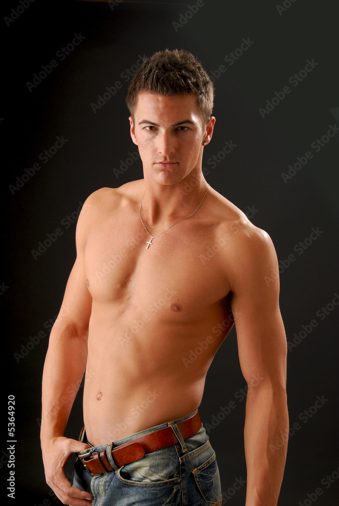 A handsome young fashion model with attitude Stock Photo | Adobe Stock
