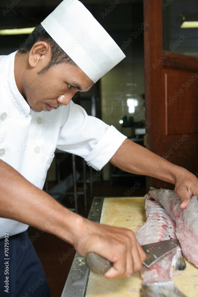 chef butchering barracuda fish Stock Photo | Adobe Stock