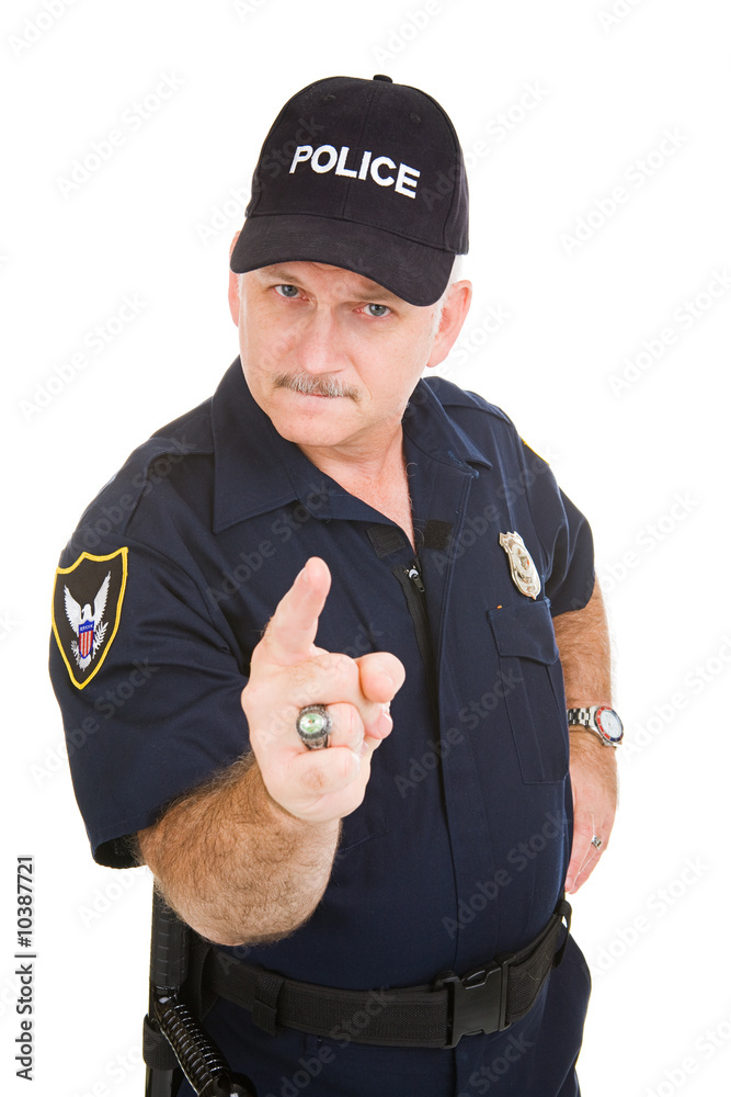 Angry looking police officer pointing his finger at you. Stock Photo ...