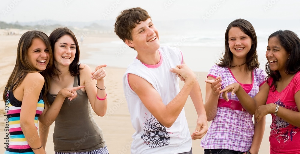 teen girls teasing boy Stock Photo | Adobe Stock