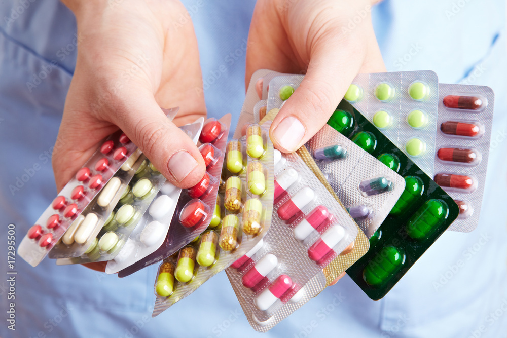 Viele Tabletten halten Stock Photo | Adobe Stock