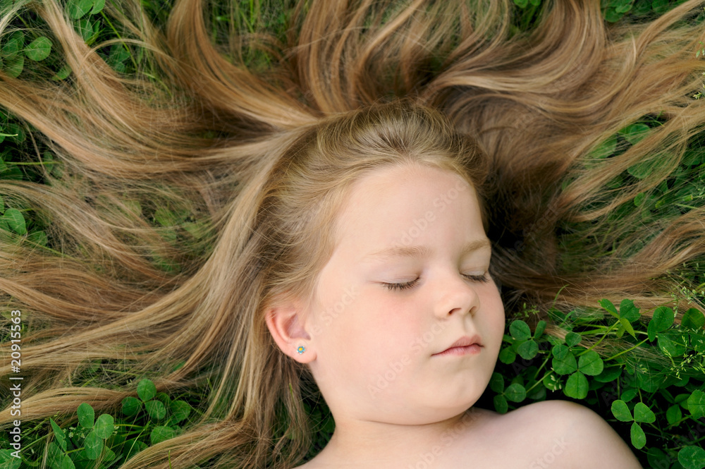 Little girl sunbathing Stock Photo | Adobe Stock