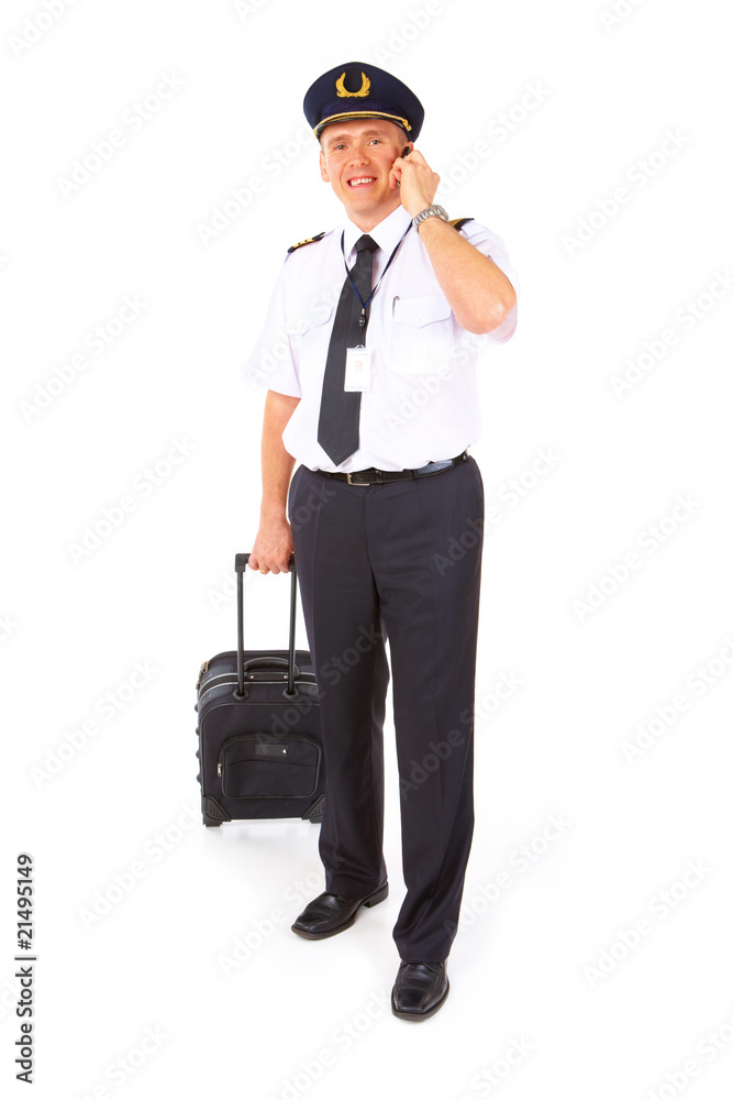 Airline pilot with trolley Stock Photo | Adobe Stock