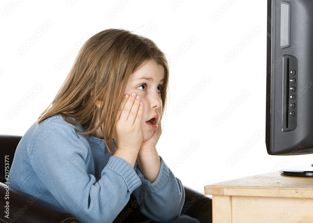 Young Child Watching TV Stock Photo | Adobe Stock