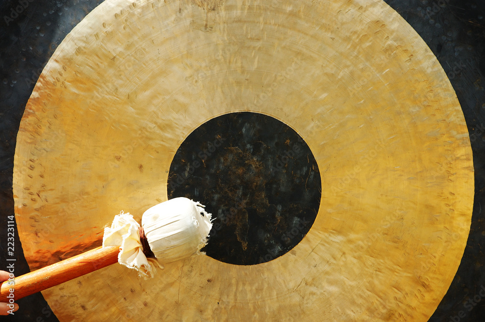 gong with hammer Stock Photo | Adobe Stock