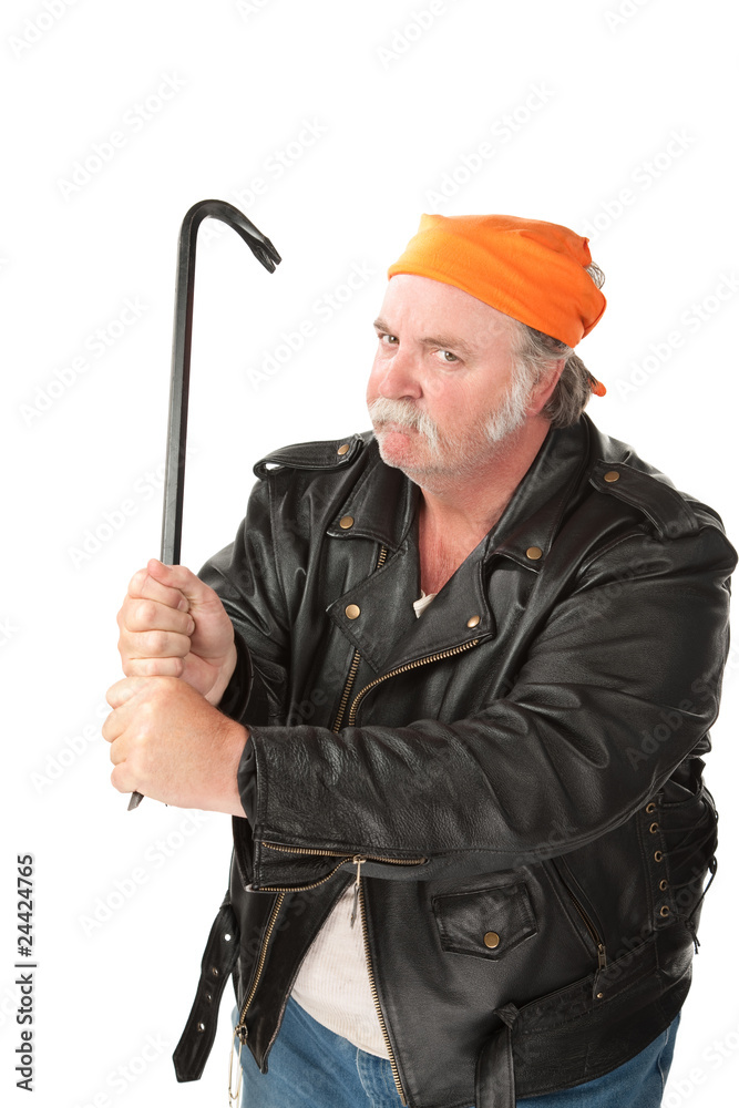 Man wielding a crowbar Stock Photo | Adobe Stock