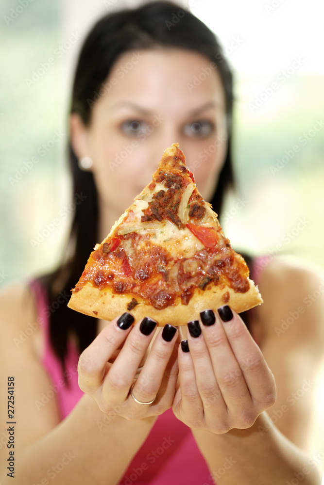 Teenage Girl Eating Pizza Slice. Model Released Stock Photo | Adobe Stock
