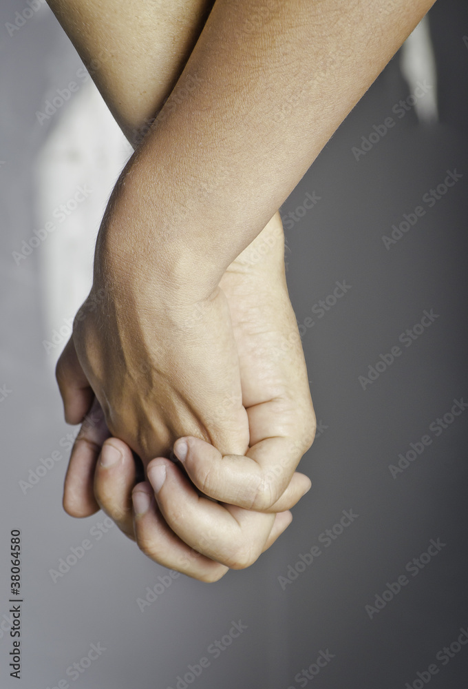 manos entrelazadas Stock Photo | Adobe Stock