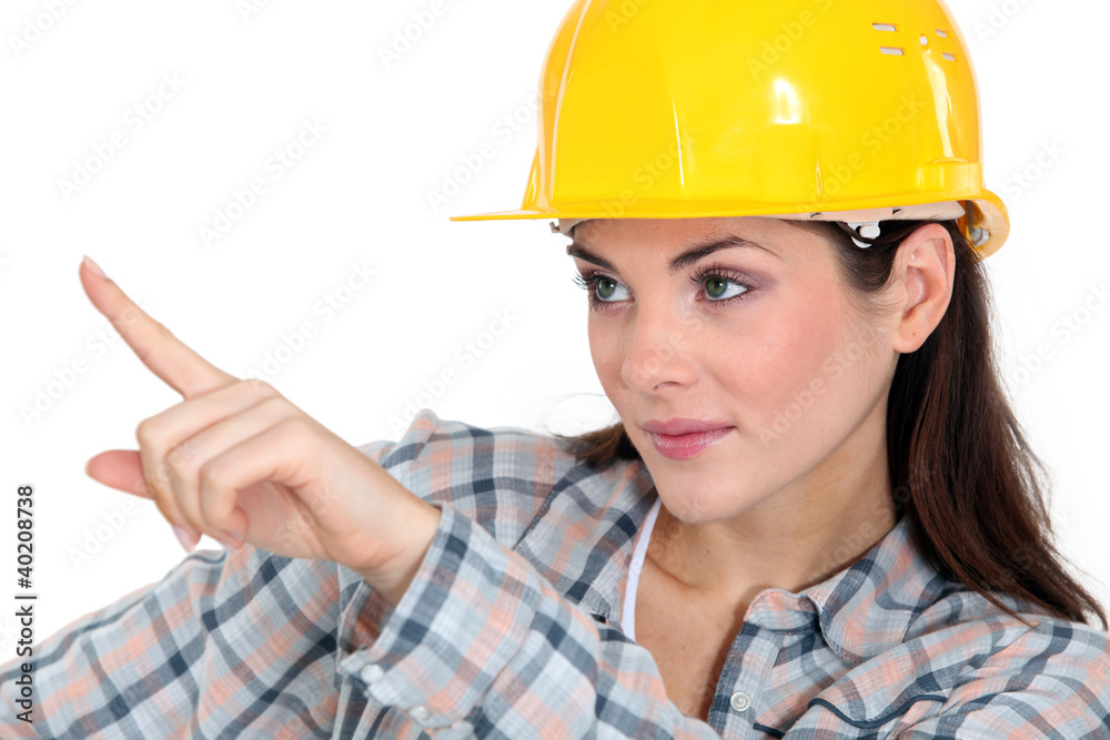 Female construction worker pointing her finger Stock Photo | Adobe Stock