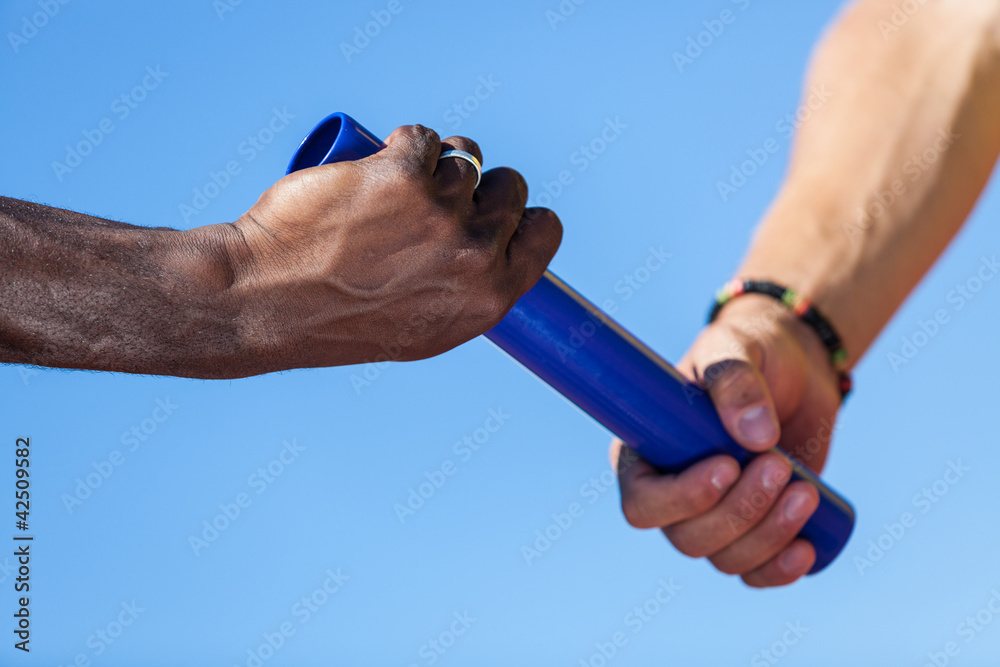 Passing the Relay Baton Stock Photo | Adobe Stock