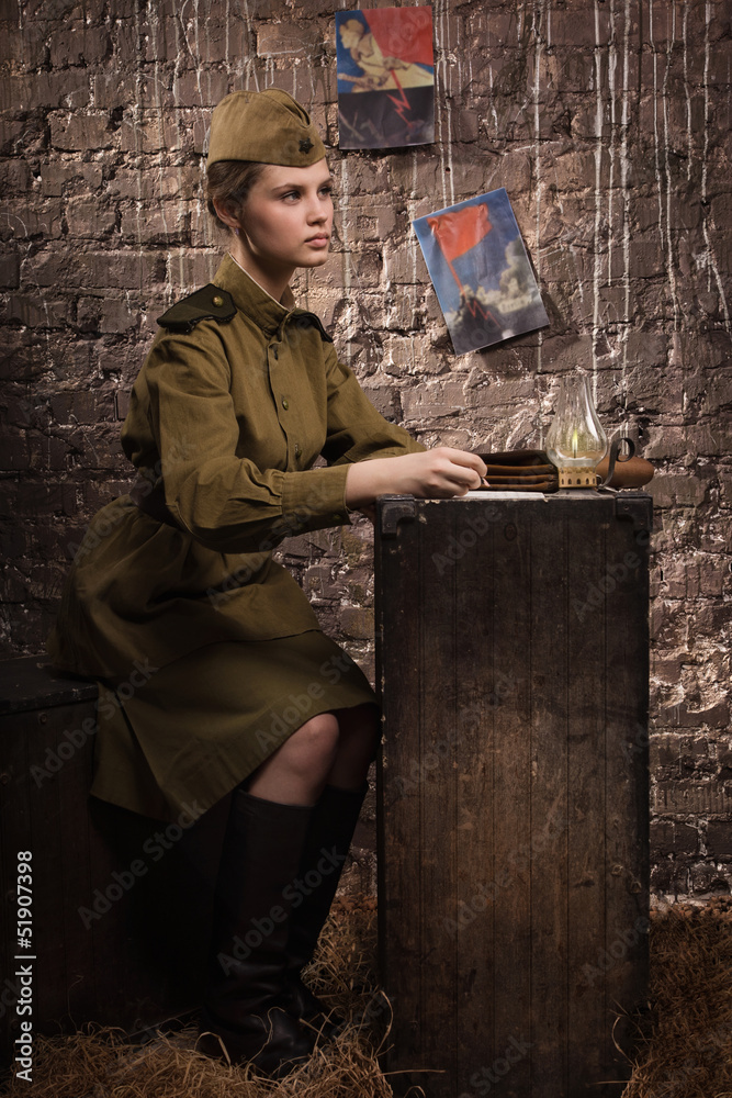 Soviet female soldier in uniform of World War II writes a letter Stock ...