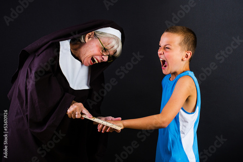 nun hitting a boy Stock Photo | Adobe Stock