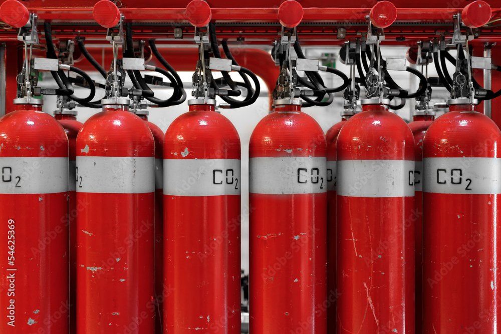 Large CO2 fire extinguishers in a power plant Stock Photo | Adobe Stock