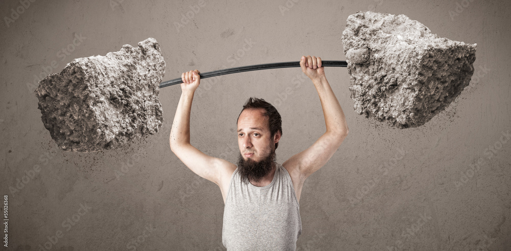 skinny guy lifting large rock stone weights Stock Photo | Adobe Stock
