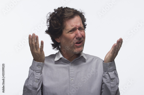 Exasperated man with hands in air, horizontal Stock Photo | Adobe Stock