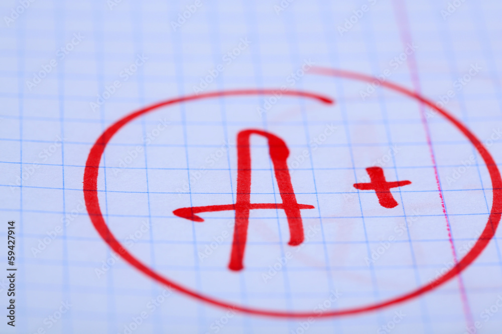 Grade A+ written on an exam paper Stock Photo | Adobe Stock