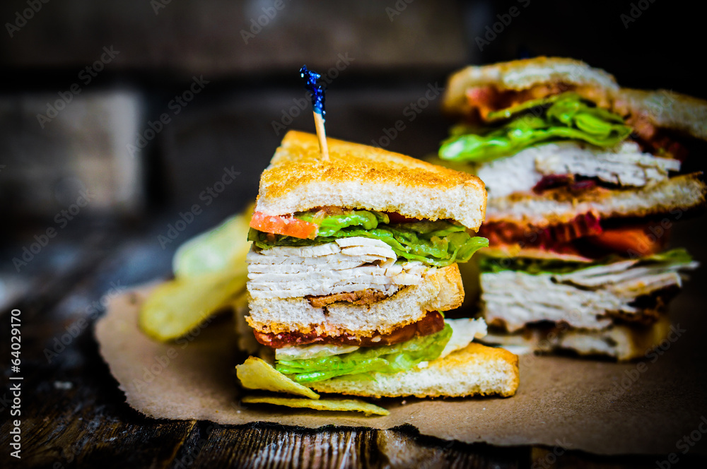 Club sandwich on rustic wooden background Stock Photo | Adobe Stock