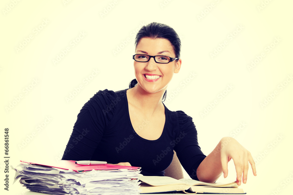 Woman filling out tax forms Stock Photo | Adobe Stock