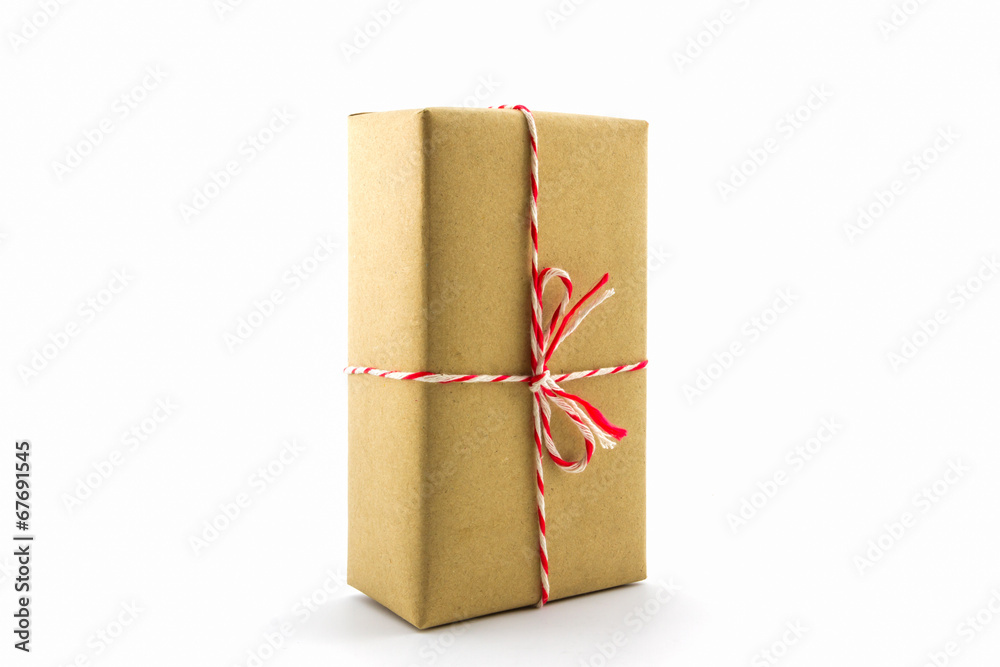 Cardboard carton wrapped with brown paper, tied with string. Stock ...