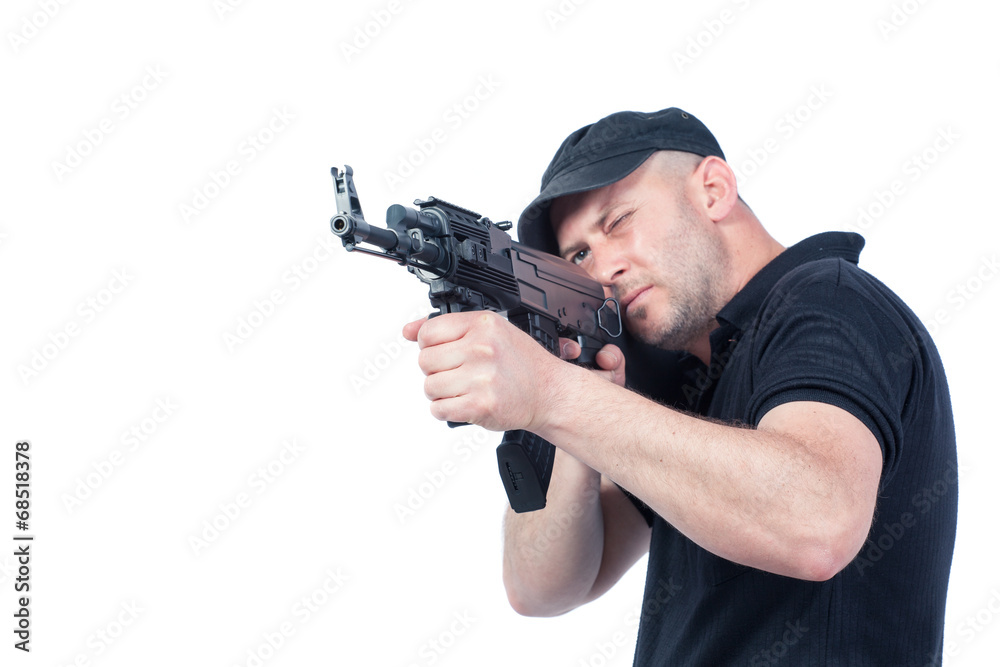Man pointing AK-47 machine gun, isolated. Focus on the gun Stock Photo ...
