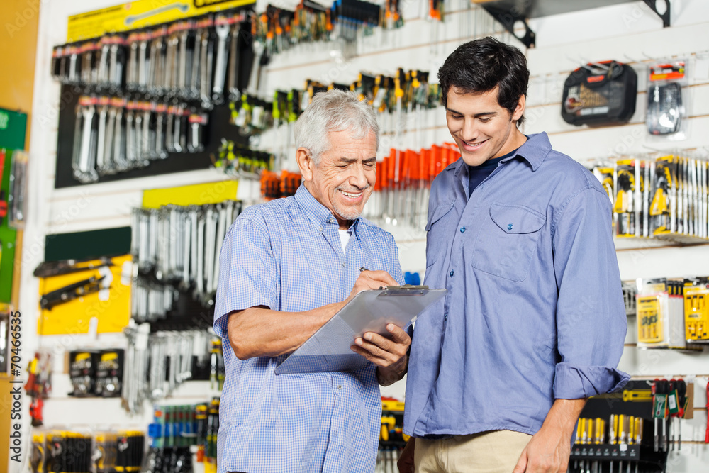 Customers Checking Checklist In Hardware Store Stock Photo | Adobe Stock