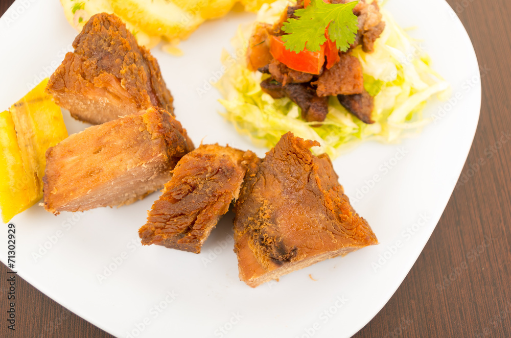 fritada fried pork traditional ecuadorian food Stock Photo | Adobe Stock