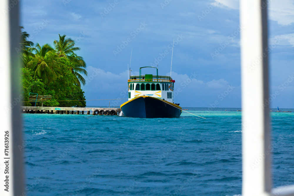 Rest in Paradise - Malediven - Fischerboot im Meer Stock Photo | Adobe ...