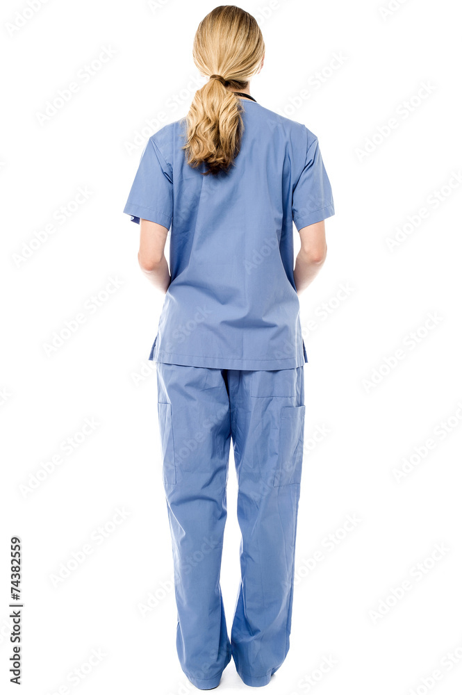 Back pose of young female doctor Stock Photo | Adobe Stock