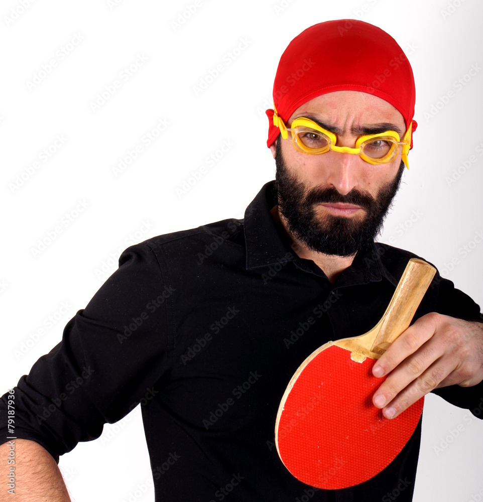 Man playing ping pong wearing swimming cap Stock Photo | Adobe Stock