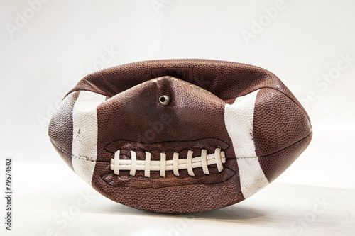 Deflated Football - Buy this stock photo and explore similar images at ...