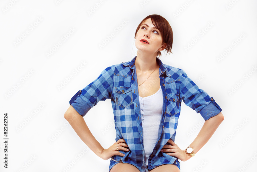 A portrait of a young beautiful girl who is sitting akimbo and t Stock ...