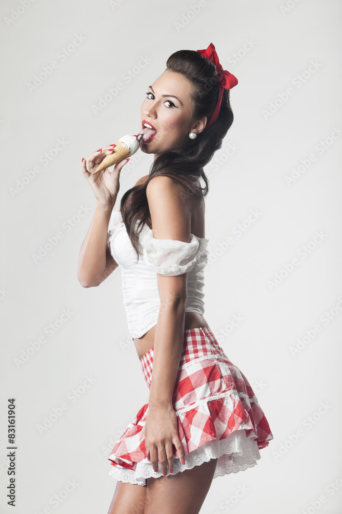 Pin up girl eating ice cream Stock Photo | Adobe Stock