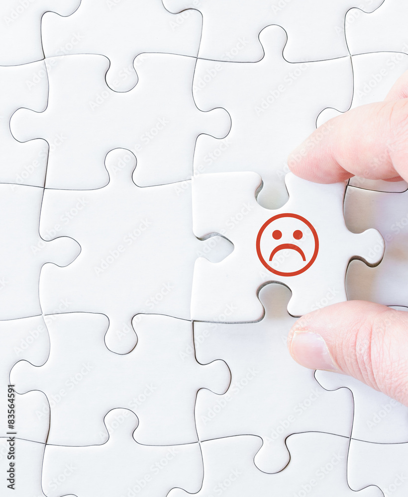 Missing jigsaw puzzle piece with sad emoticon face Stock Photo | Adobe ...