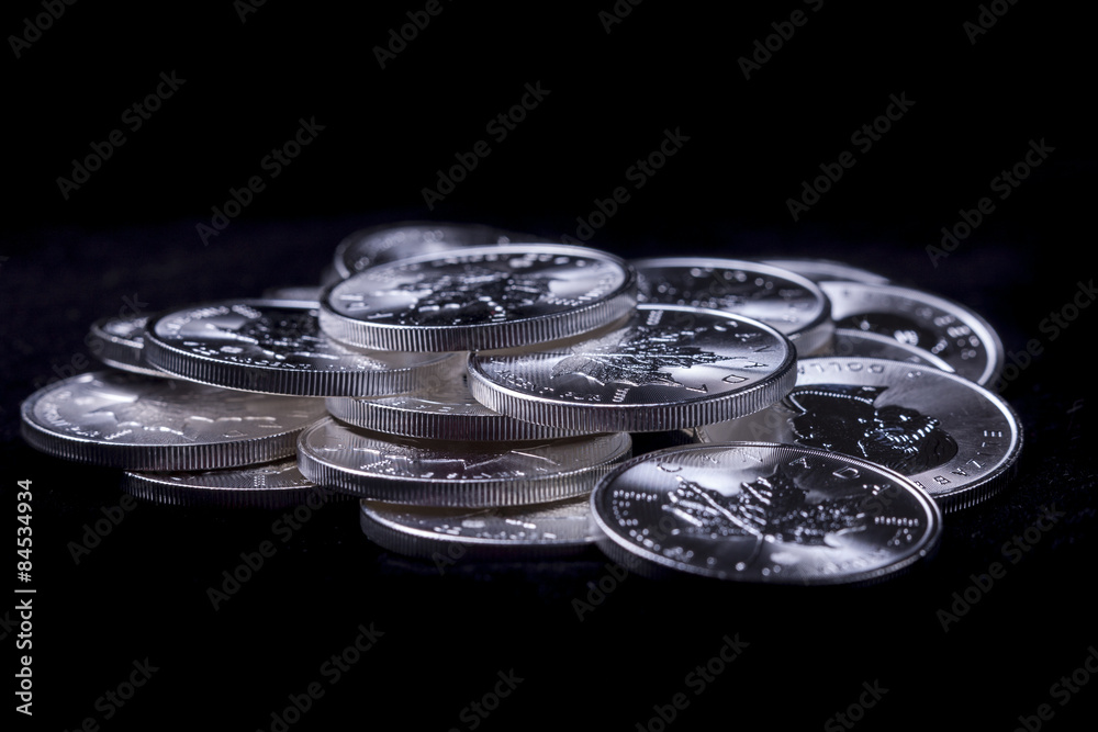 Pile of silver coins. Stock Photo | Adobe Stock