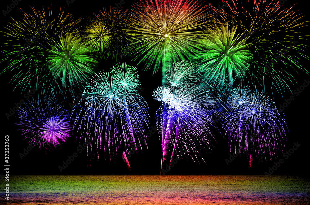 Rainbow Firework celebration on dark background. Stock Photo | Adobe Stock