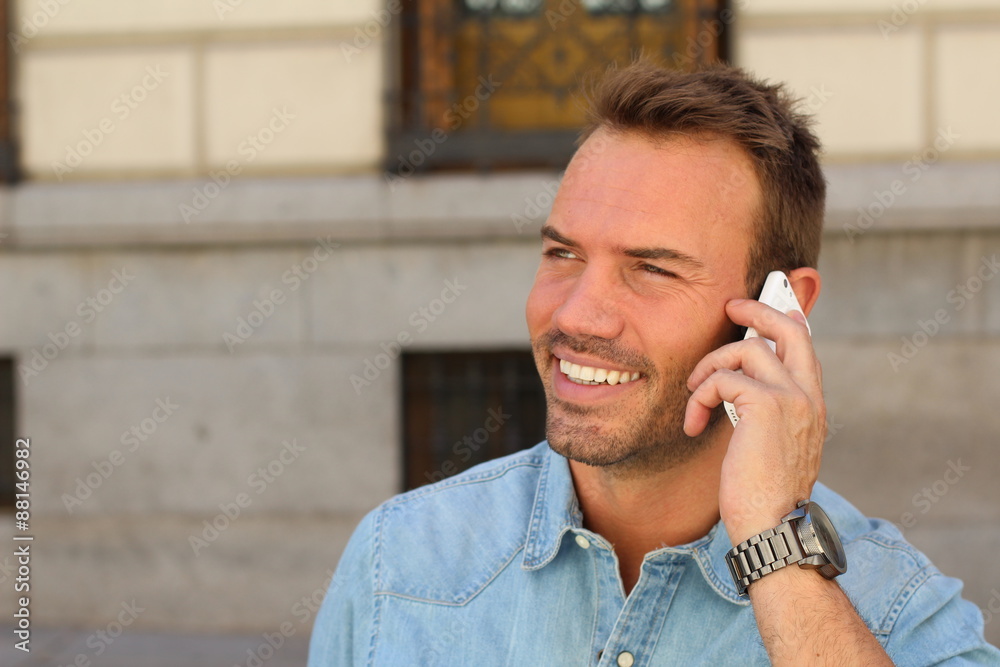 Stock-Foto „Hot young man calling with mobile phone . He is calling ...