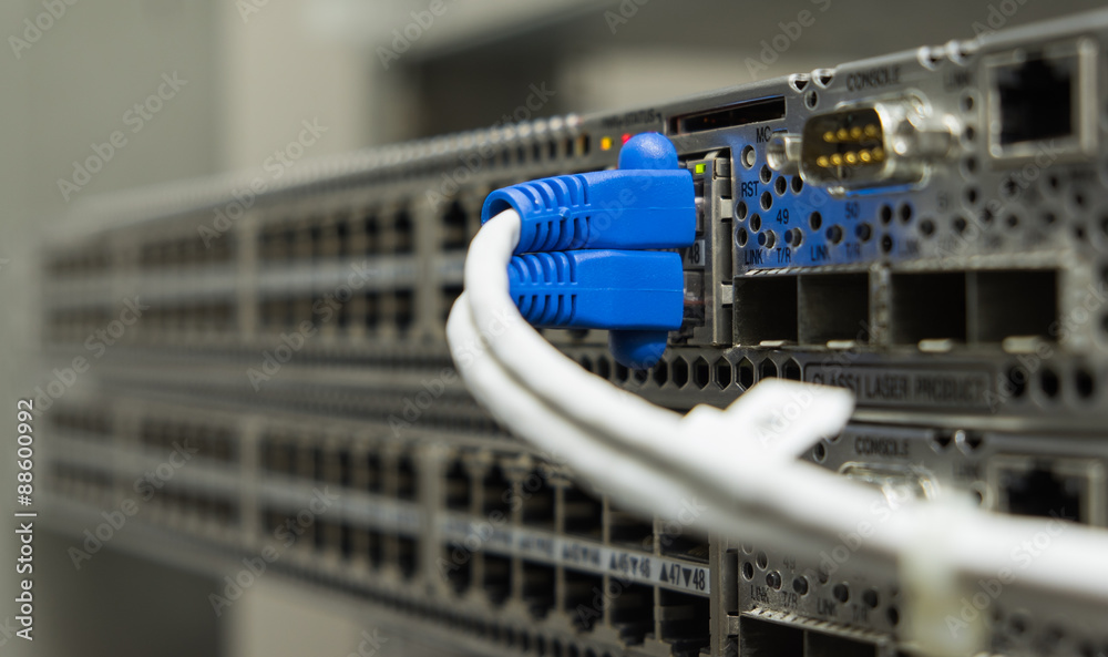 Lan utp cable plug in network switch Stock Photo | Adobe Stock