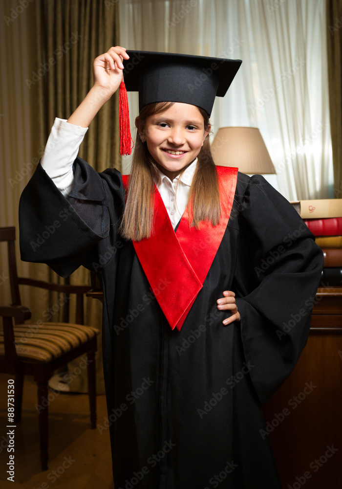 girl in graduation cap and gown posing at classic interior Stock Photo ...