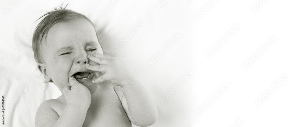 baby crying teething Stock Photo | Adobe Stock