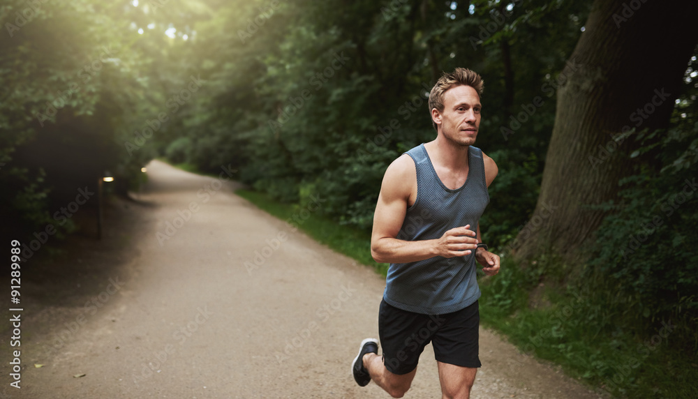 Athletic Man Doing Running Exercise at the Park Stock Photo | Adobe Stock