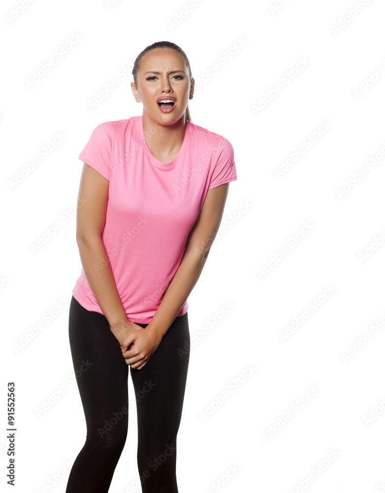 beautiful young athlete has the need for toilet Stock Photo | Adobe Stock