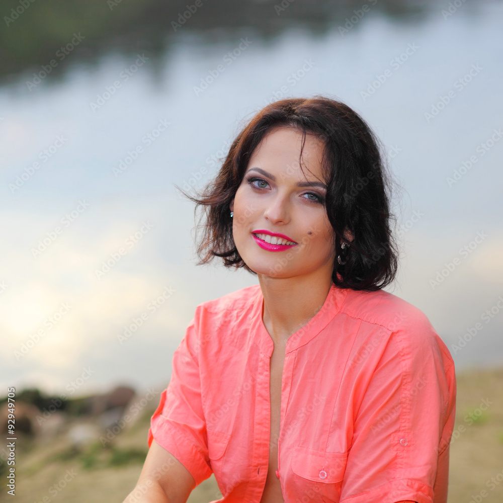 young beautiful sexy woman on the beach. beautiful girl sitting on the ...