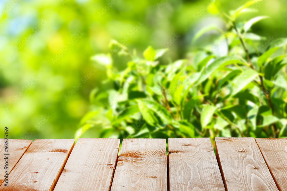 Wooden table with nature background Stock Photo | Adobe Stock