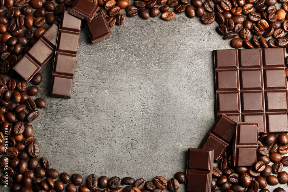 Dark chocolate pieces and coffee grains on dark gray background Stock ...