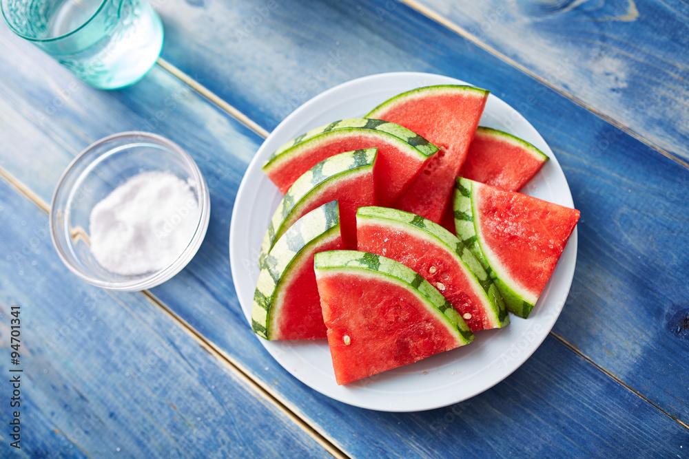 watermelon slices with sprinkled salt Stock Photo | Adobe Stock