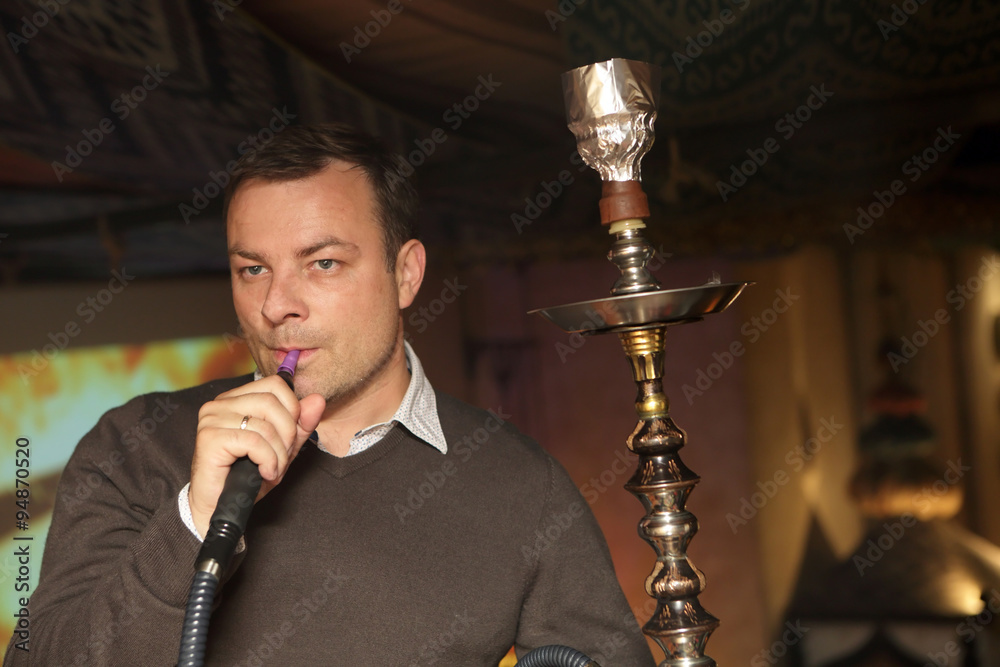 Stock-Foto „Man with shisha“ | Adobe Stock