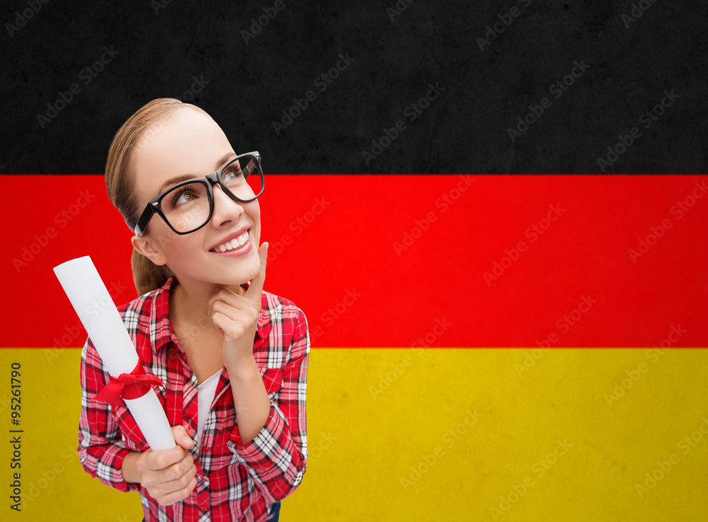 smiling student with diploma over german flag Stock Photo | Adobe Stock