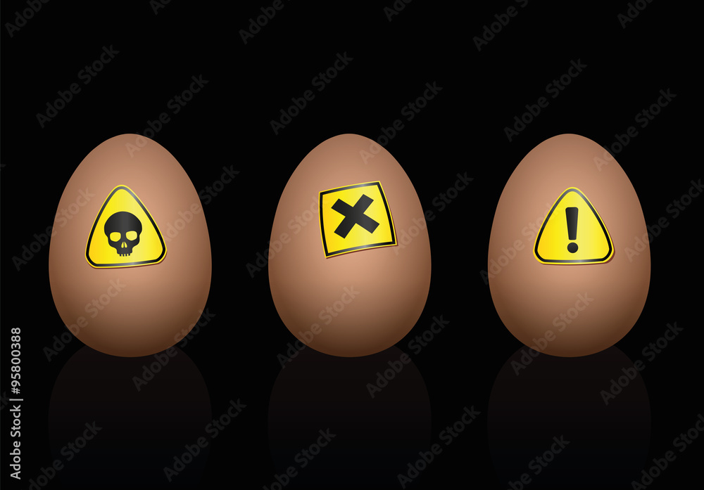 Eggs with hazard symbols on it - warning against unhealthy food or ...